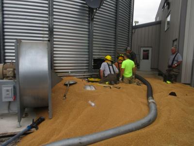 Smoldering grain bin southeast of Defiance keeps first responders busy ...
