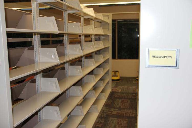Parting with the past – dumpster filled with books outside Florida Tech ...