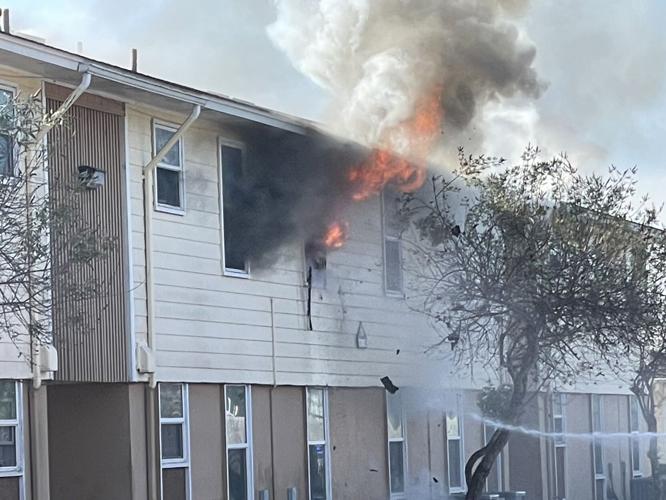 Firefighters extinguish flames at an apartment in Victoria | Local News ...