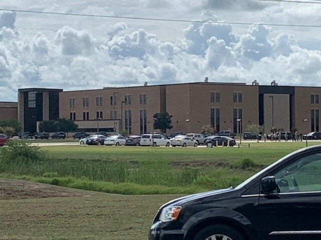 Local officials investigate a potential threat at Victoria East High ...