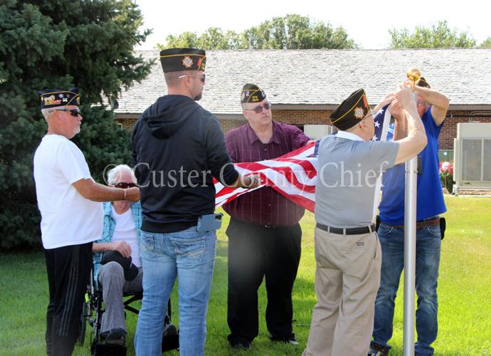 WWII vet raises flag on new pole at Liberty Square | News ...
