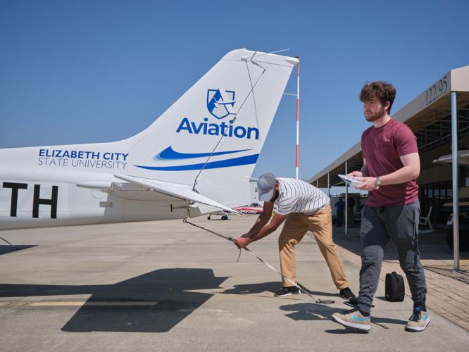 Pilot's job: Check. United pact to aid ECSU students | Local News ...