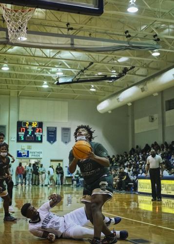 High School Basketball | Saunders, Eagles push away Panthers | Local ...