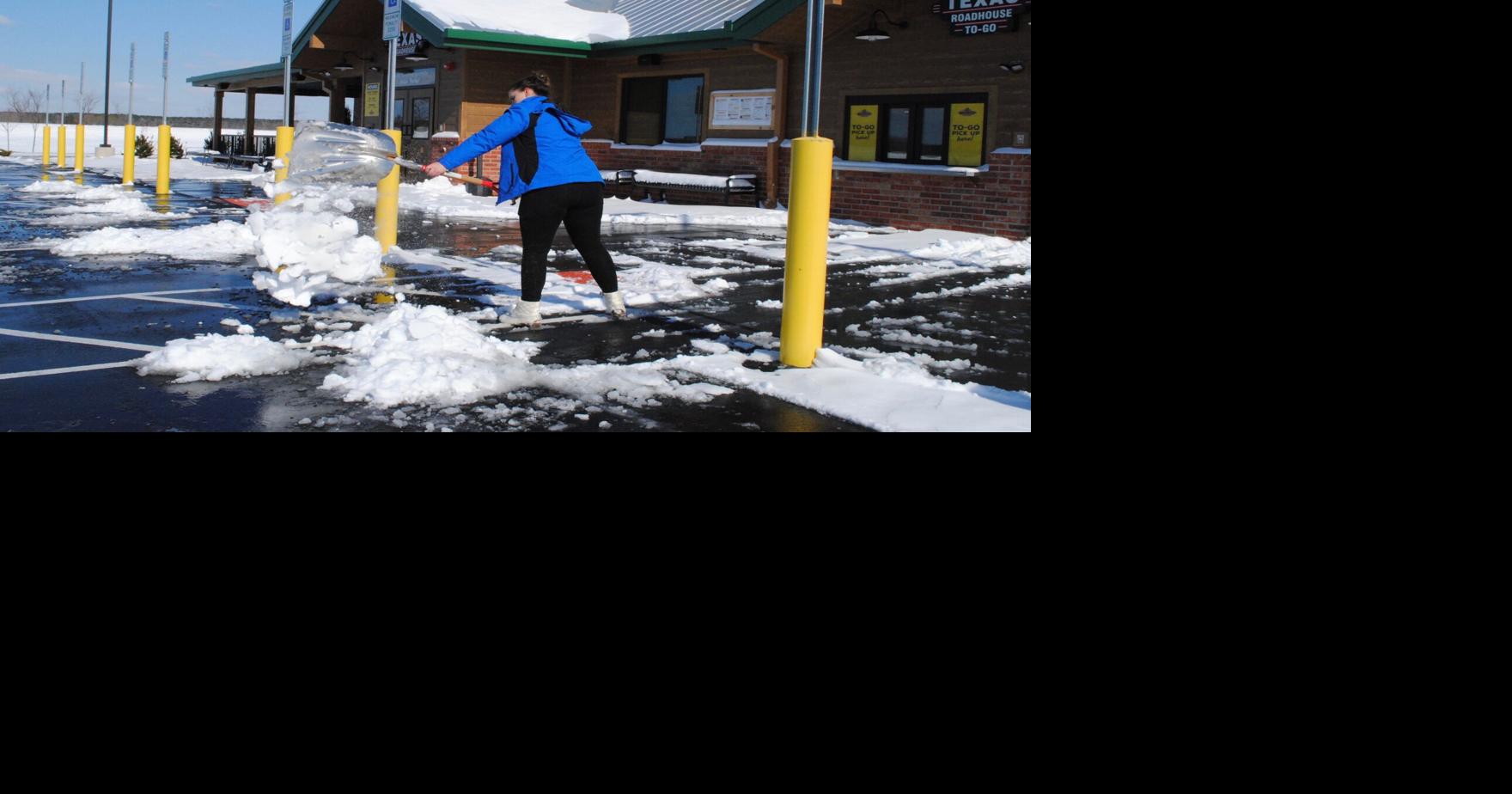 EC residents dig out, build snowmen after winter storm brings rare ...