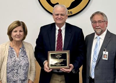 Jordan honored by school board on his retirement | Features ...