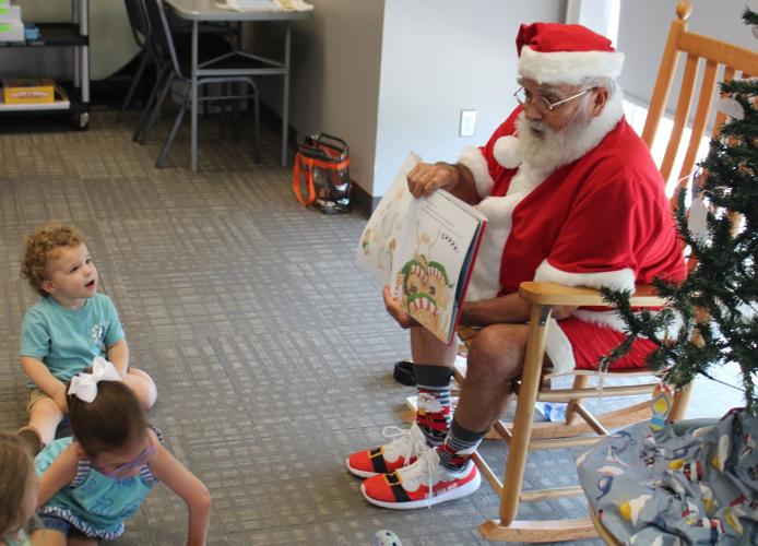 'The Big Guy' visits local kids on the way to the beach ...