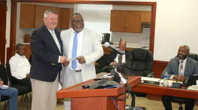 ABC Board delivers funds | News | dailyadvance.com