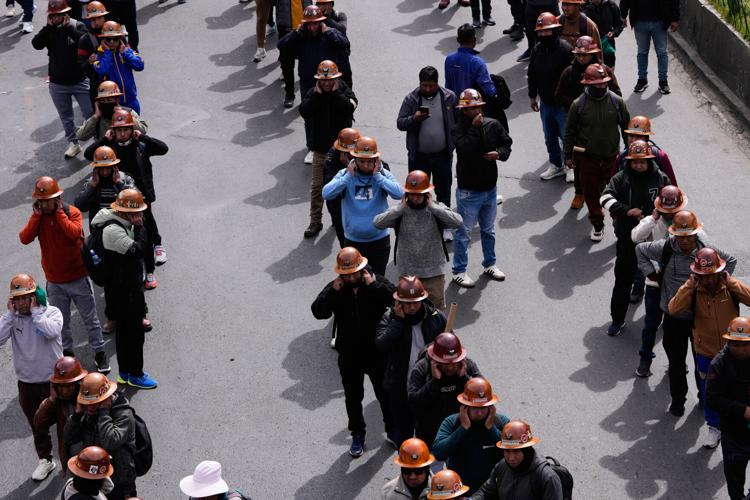 Photos of mass protests and road blockades choking the Bolivian capital ...