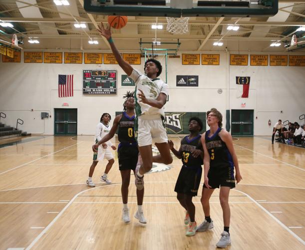 High School Basketball | Northeastern boys need overtime to beat John A ...