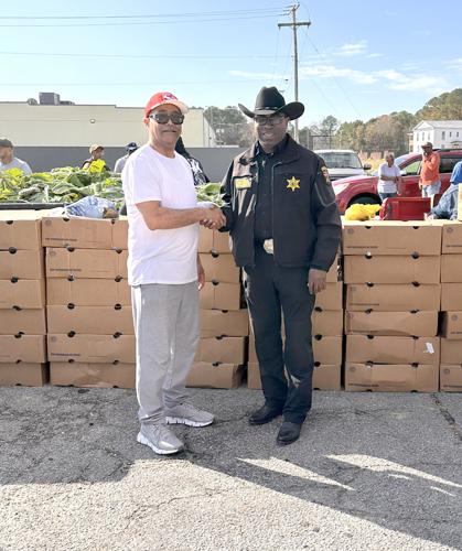 Outlaws host third annual turkey giveaway | Features | dailyadvance.com