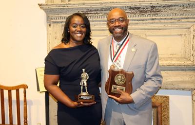 Dr. Smallwood, Outlaw receiving awards | News | dailyadvance.com