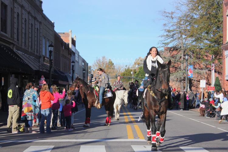 Warm weather draws more parade entrants at Hertford Christmas Parade ...