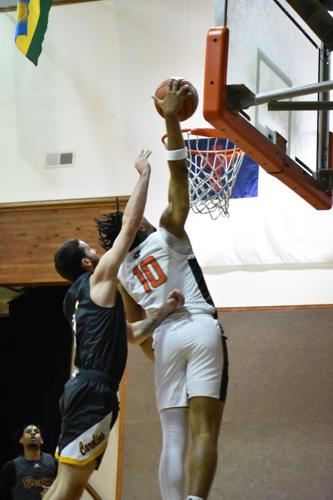 Clough scores 17 in return in 70-68 MACU win | College | dailyadvance.com