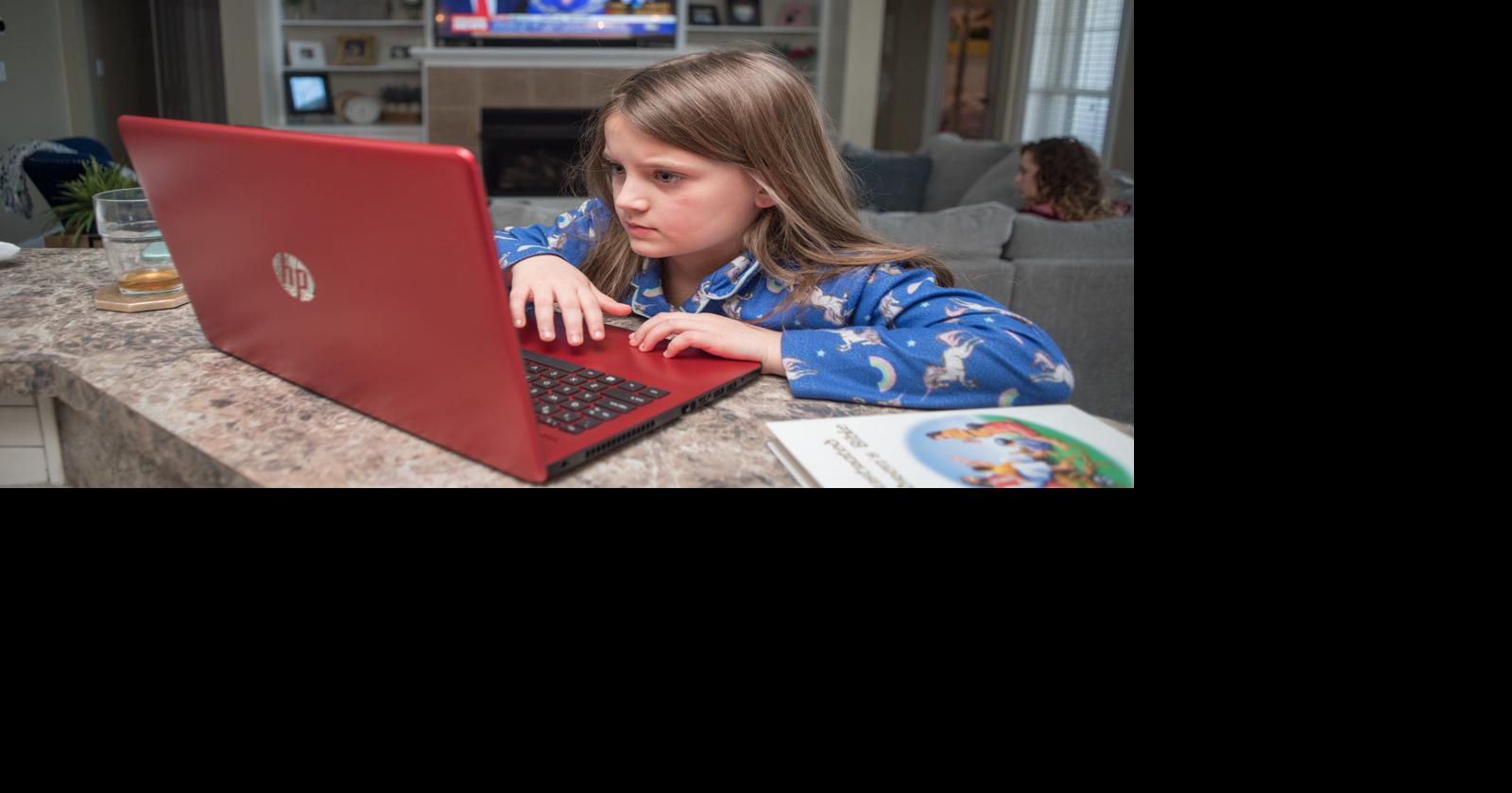 Remote learning begins: Students, parents adjusting to school changes ...