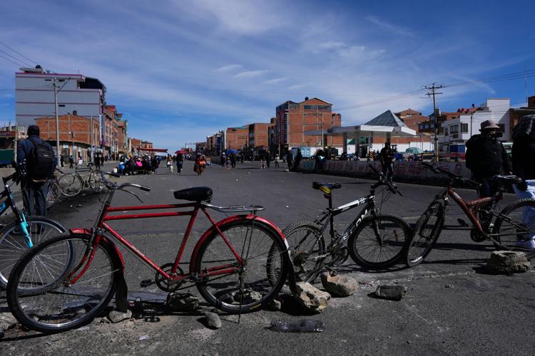 Photos of mass protests and road blockades choking the Bolivian capital ...
