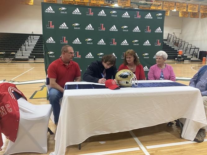 Six Eagles sign to play collegiate football | Local | dailyadvance.com