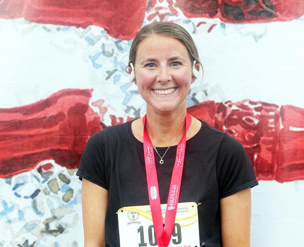 New, returning runners race through historic downtown in Coke 10K ...