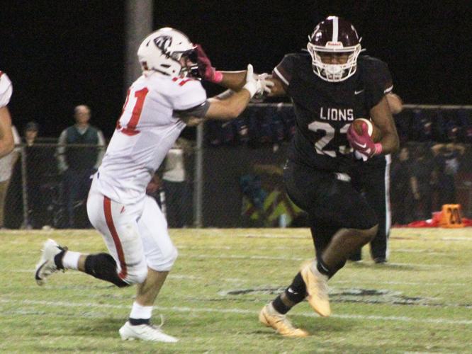 Warriors hold off Trojans for first division victory | Sports ...