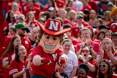 Curious Cornhuskers: The meaning behind Herbie’s foam finger gesture ...