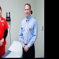 Health center employees Kim Thompson, Dr. Nathan Haecker receive ...