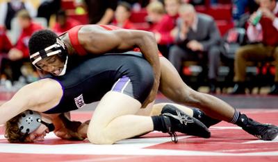 NU freshman wrestler TJ Dudley's unorthodox style gives him edge ...