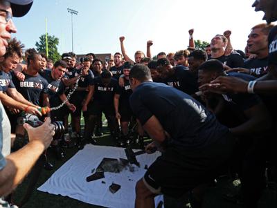 Virginia linebacker Jordan Mack 'breaks the rock' to cap summer workouts