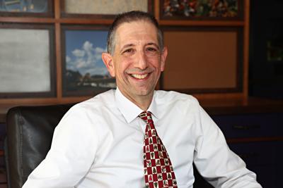 Dozen: Squillace leads community by focusing on 'something bigger'