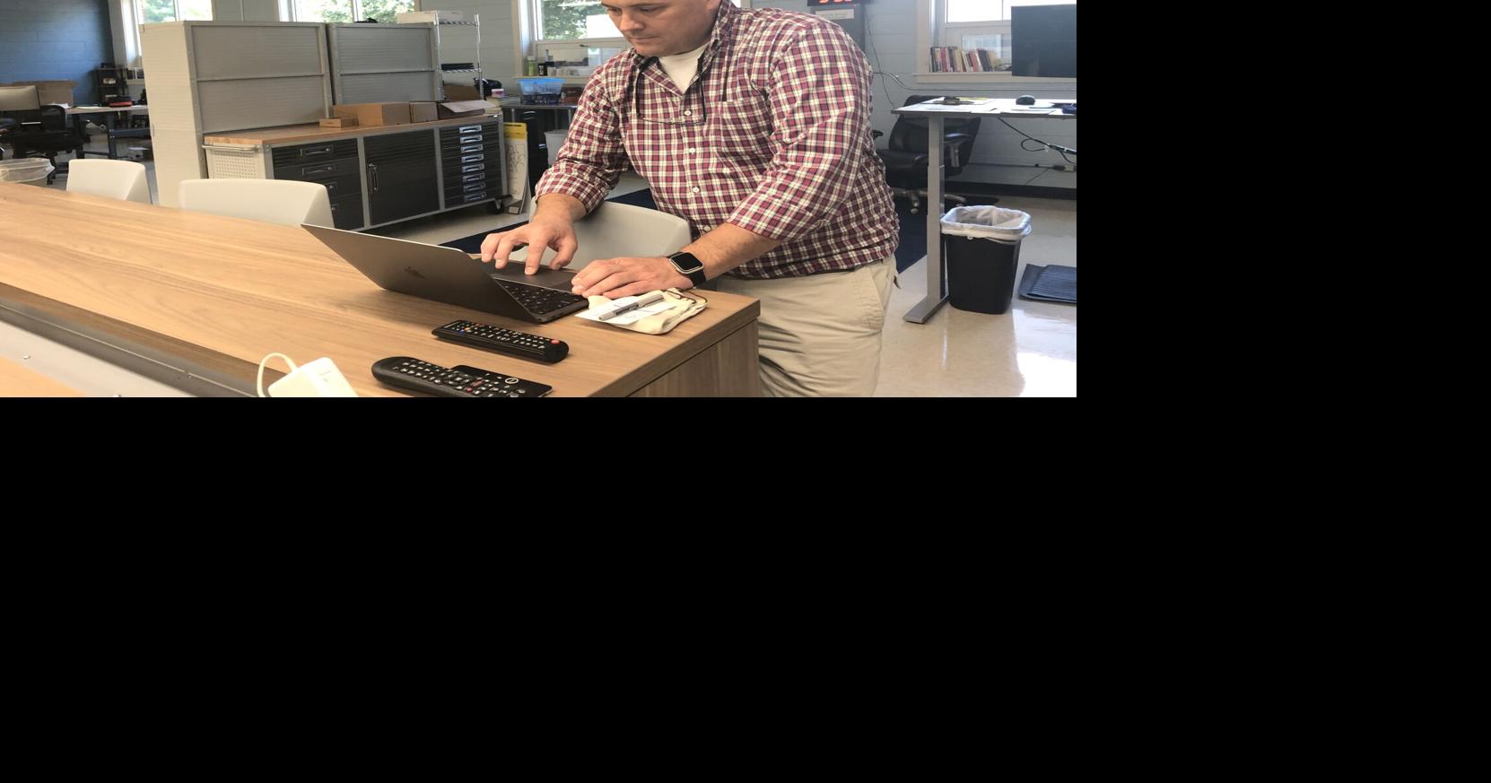 Technology director Mark Outten readies thousands of Chromebooks for ...