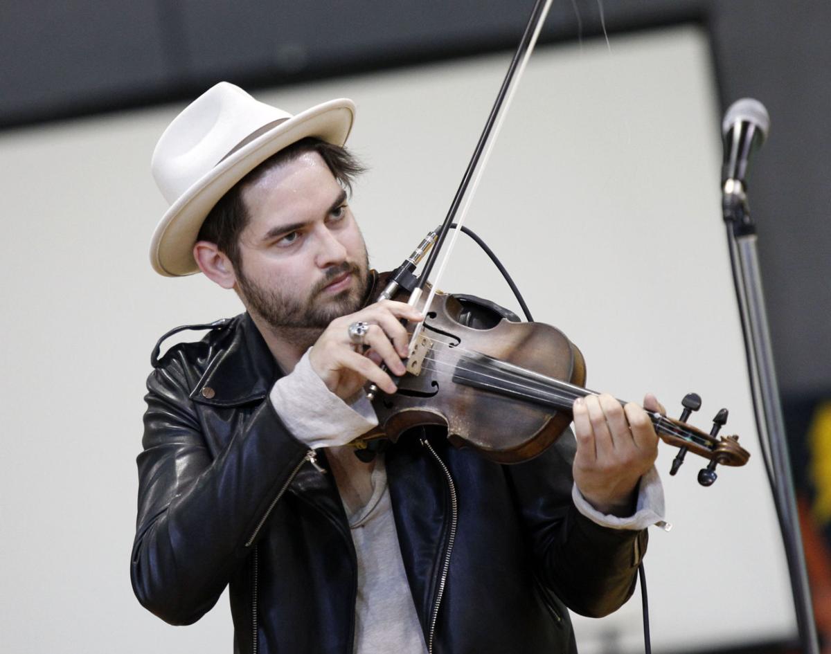 Violinist Rhett Price shares story of homelessness, success with ...