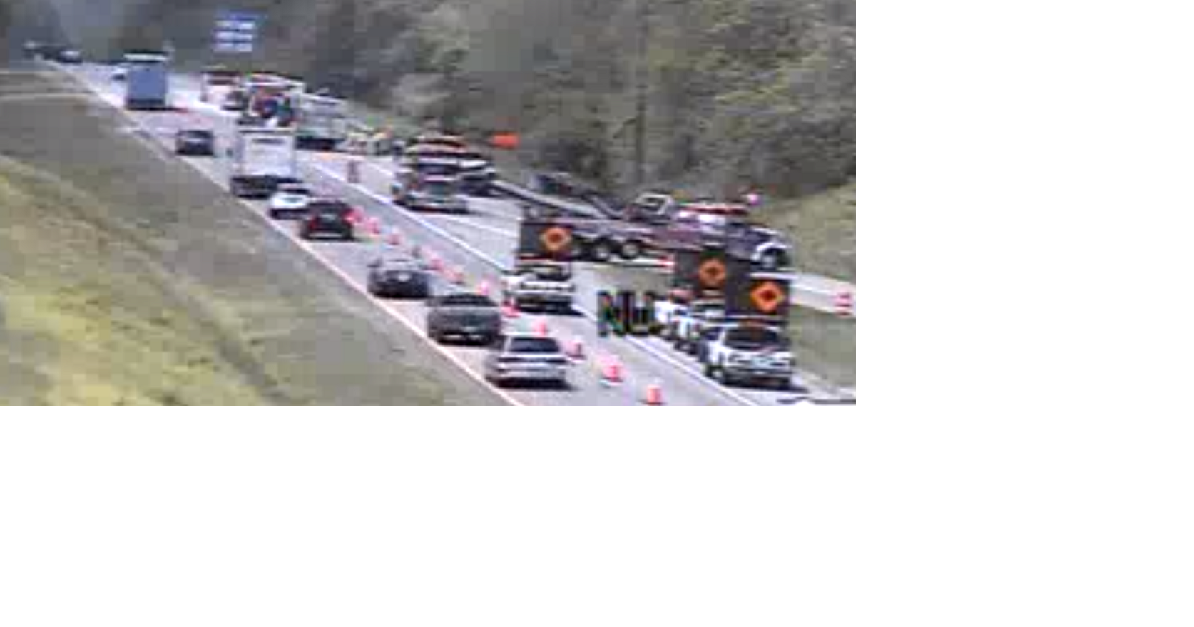 Truck crash covers interstate with corn debris