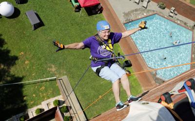 Rappelling at Omni hotel gives area Girl Scouts an 'edge'