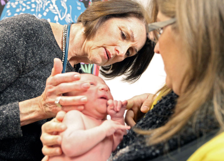 Dozen: For pediatric nurse McRae, caring extends to families' well-being