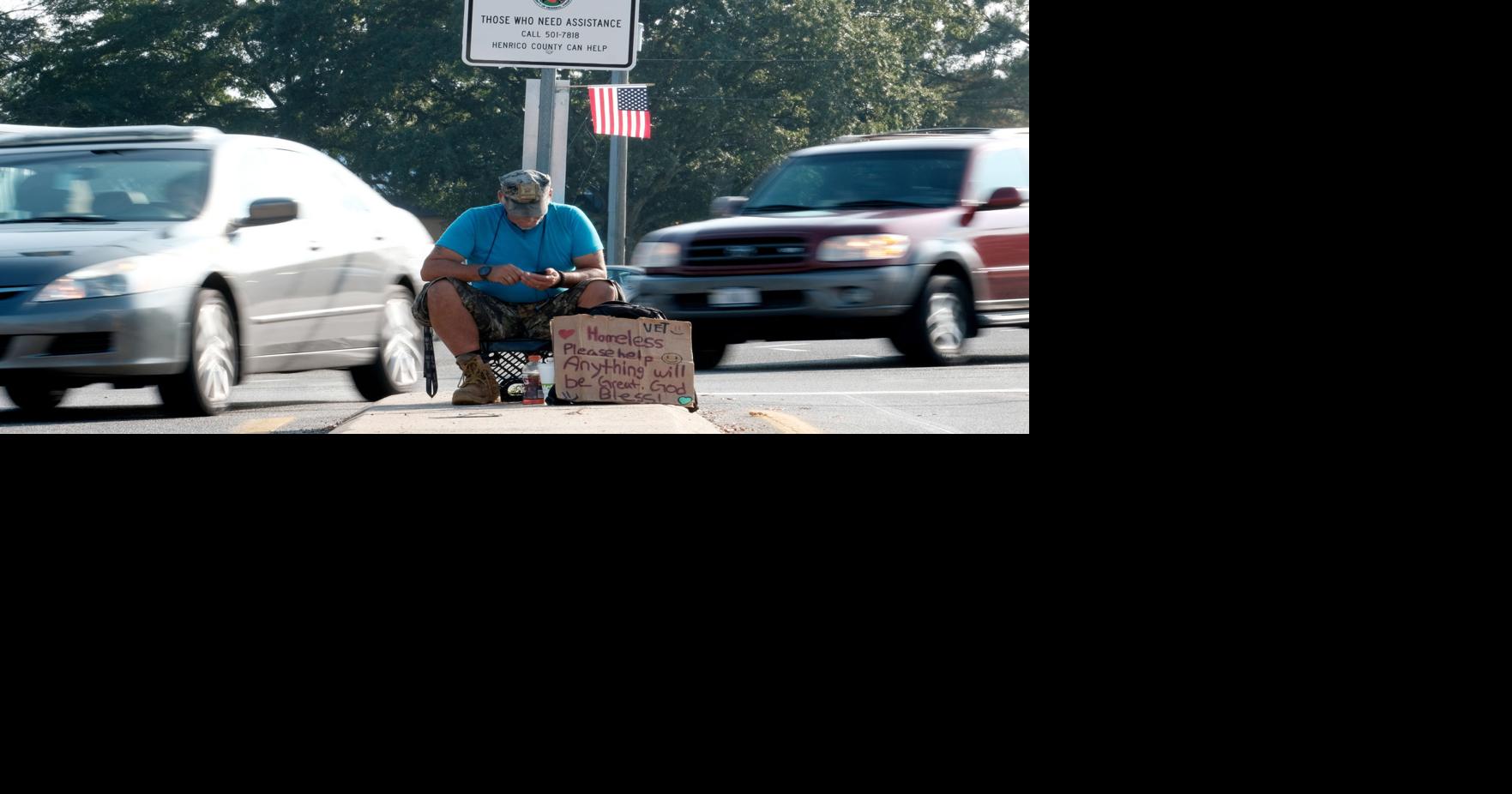 To discourage panhandling, a Virginia county puts up signs at busy ...