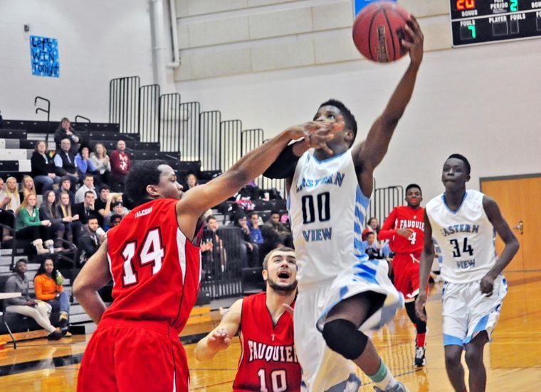 EVHS BOYS BASKETBALL: Tale of two halves