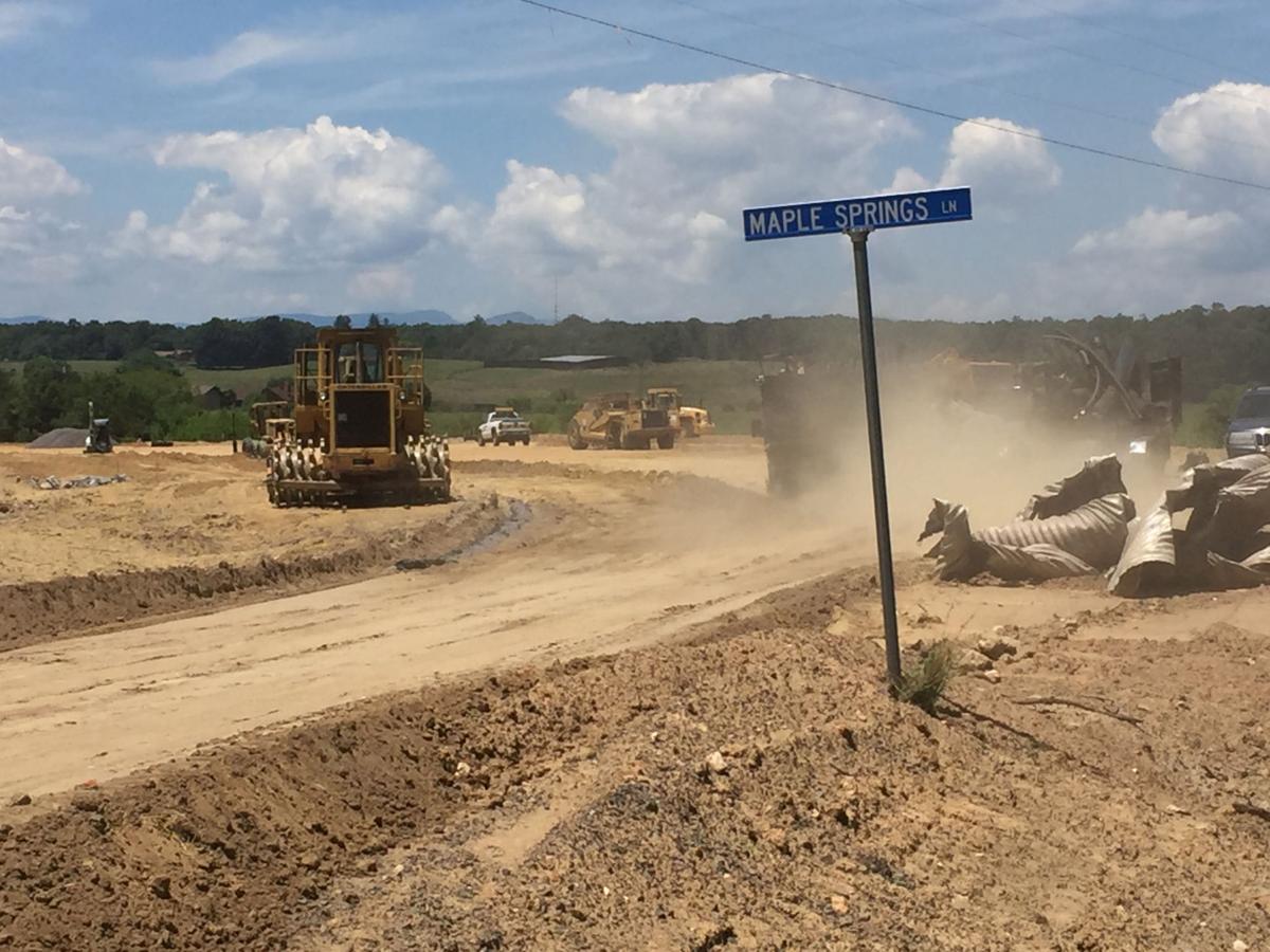 Outer loop road: Ira Hoffman Lane extended