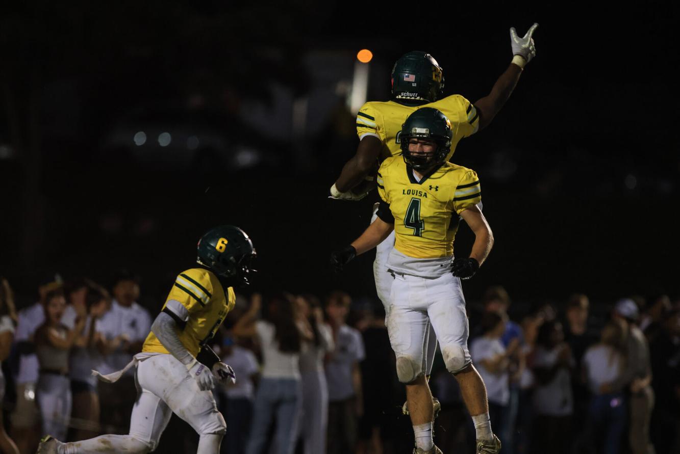 Savion Hiter and Dyzier Carter give Louisa football a boost