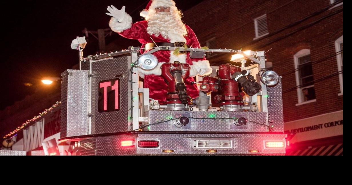 Santa, Christmas parade delight festive crowd