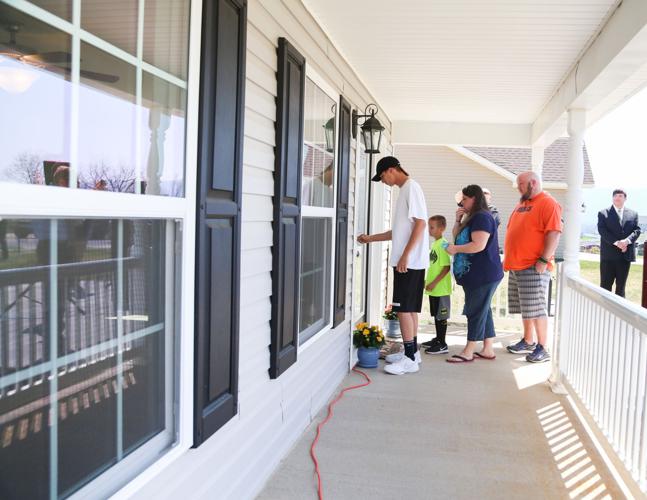 WHS student's essay earns family a home of their own