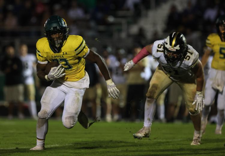 Savion Hiter and Dyzier Carter give Louisa football a boost