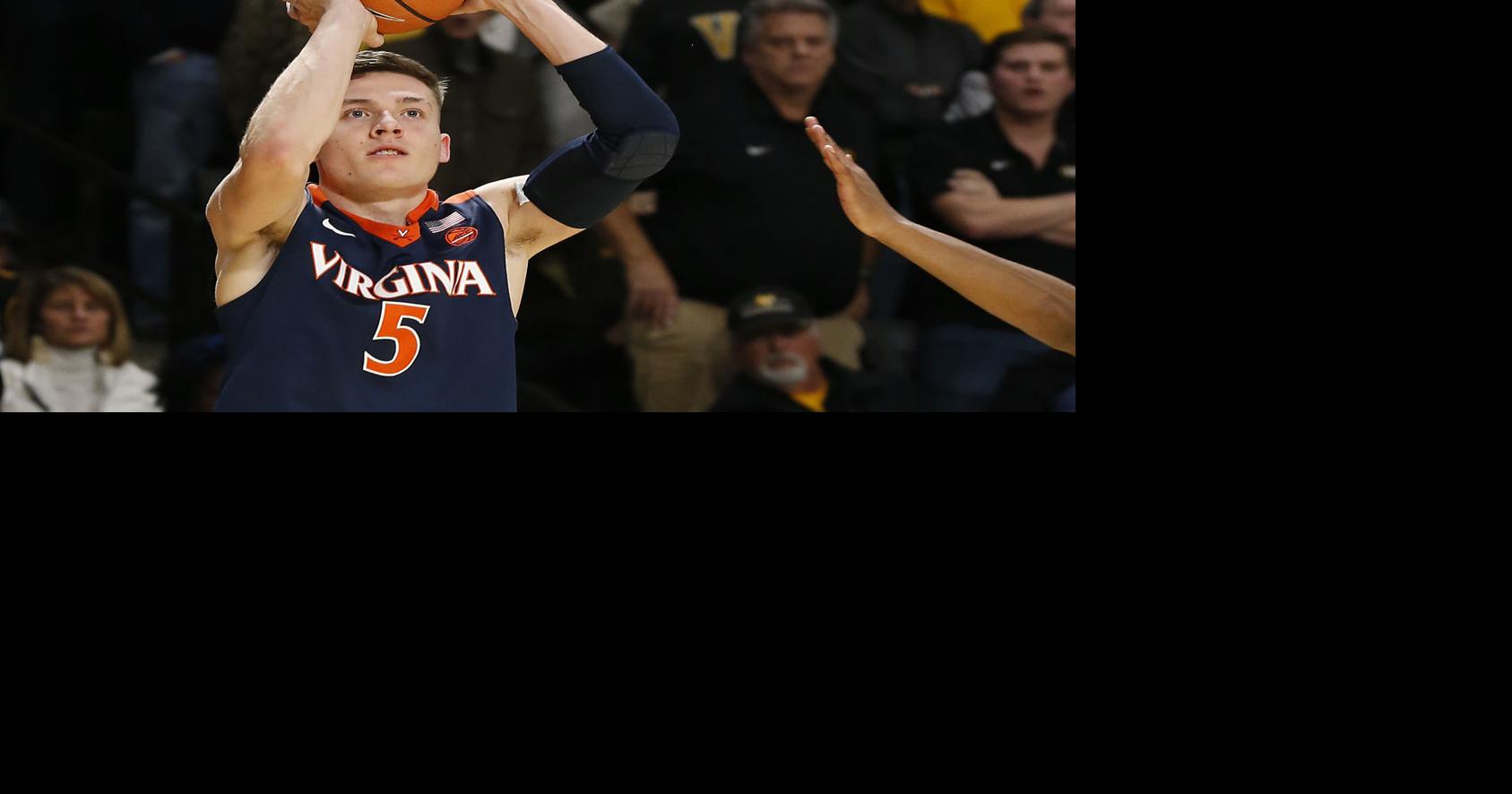 Guy scores 29 to lead Virginia past VCU