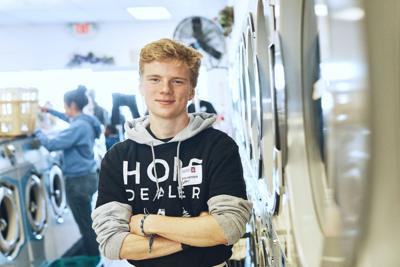 AHS student gives a helping hand with laundry