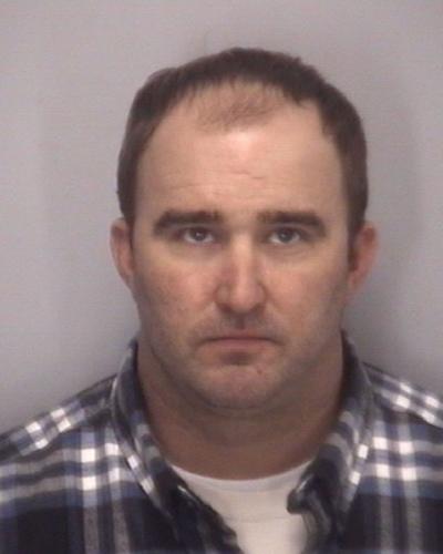 CMS wrestling coach Jeremy Engh facing gun, drug charges