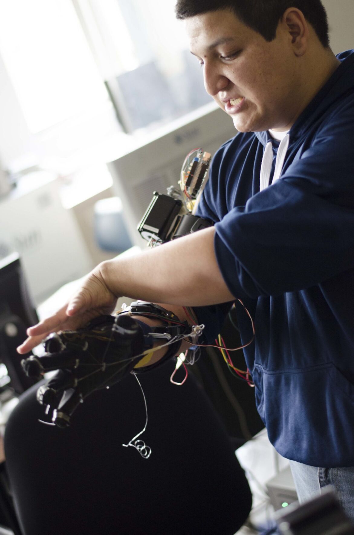 Computer science majors build robotic arm after months of planning ...
