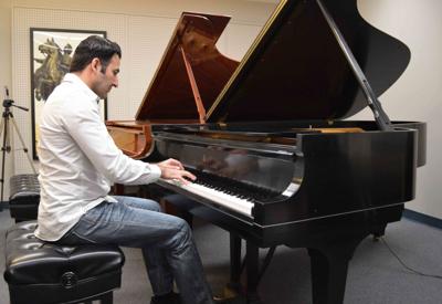 Graduate student brings music and science together through piano ...