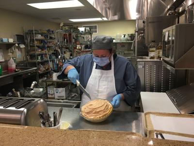 Rainbow Hospice Inpatient Center chef serves meals for patients and ...
