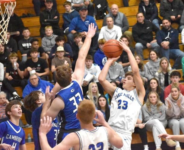 Boys basketball: Staunch defense, early 3-pointers send Lake Mills past ...