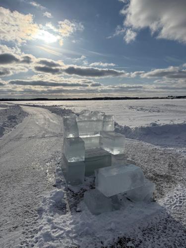 Ice Henge: Ice builders craft ice statue on Rock Lake | Local ...