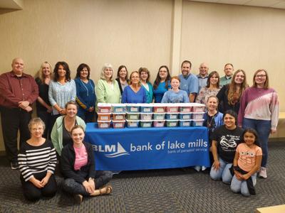 Bank of Lake Mills staff builds boxes for hospitalized children ...
