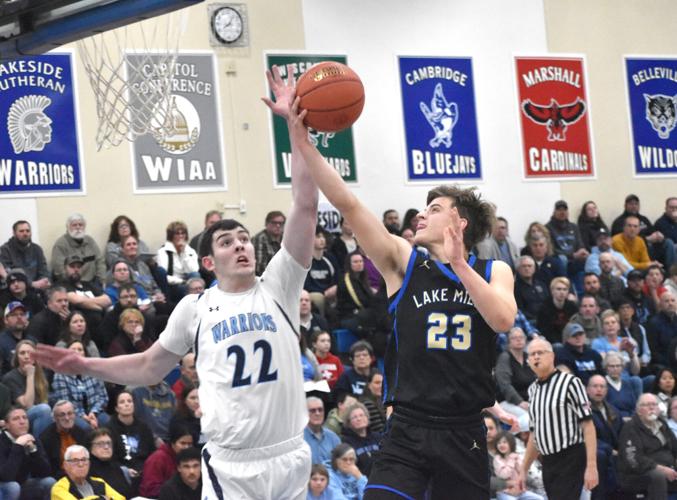 Bender reaches 2,000-point mark as Lake Mills earns long-awaited road ...