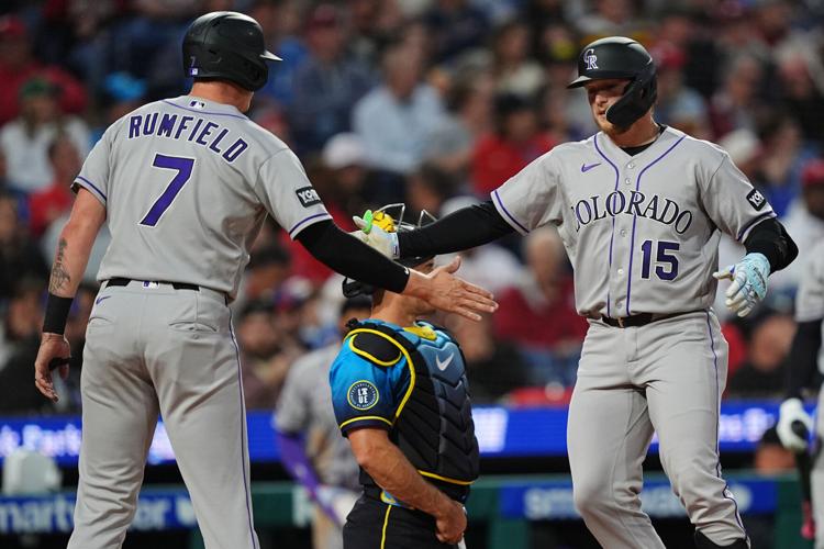 Troy Johnston has go-ahead hit in 11th as Rockies beat Phillies 9-7 ...